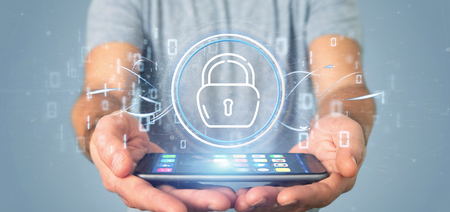 View of Businessman holding Security padlock wheel icon with stats and binary code 3d rendering ...