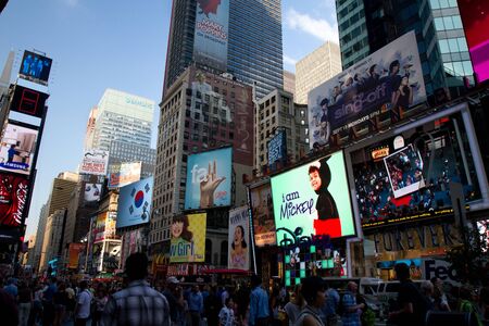 NEW YORK - SEPTEMBER 4: People, broadway shows ads and TV ad bilboards in Times Square, New York ...
