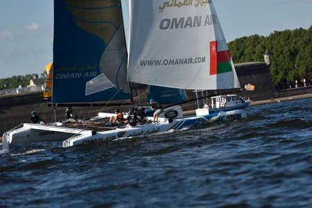 St. Petersburg, Russia - August 20, 2015: Catamaran of Oman Air sailing team during the 1st day ...