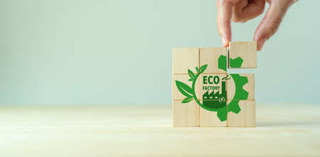 Eco industrial development concept. Eco and green factory on wooden ...