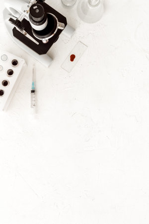Research with microscope. Laboratory backround with blood sample on ...