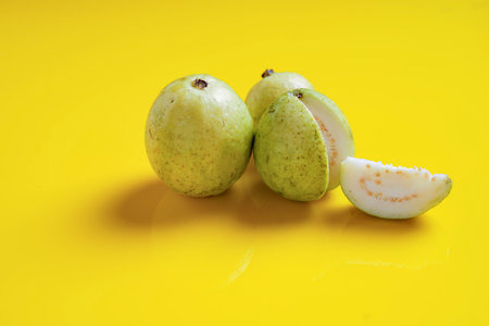 Guava or Psidium guajava Linn , fruits on yellow background.の写真素材 ...