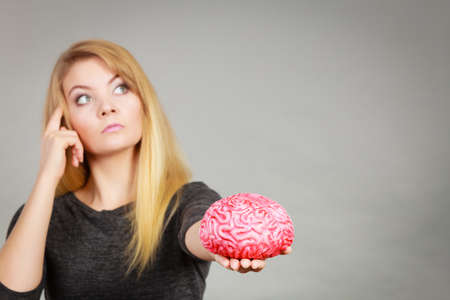 Intellectual expressions, being focused concept. Closeup of attractive ...