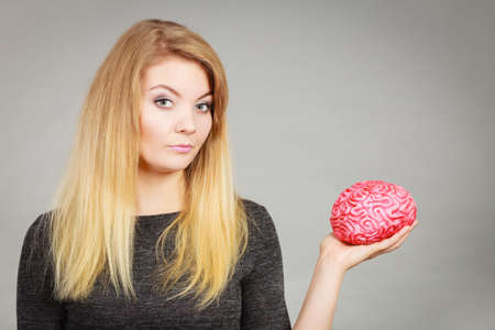 Intellectual expressions, being focused concept. Closeup of attractive ...