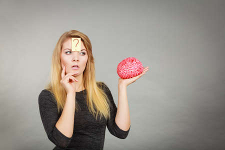 Intellectual expressions, being focused concept. Closeup of attractive ...