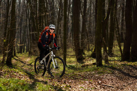 Mountain biker riding on bike in autumn inspirational mountains ...