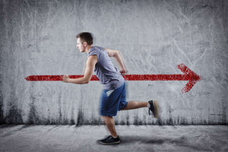 I walk my way. Young athlete running in the opposite direction ...