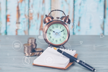 Close up of stacking coins with alarm clock ,Business Finance and Money ...