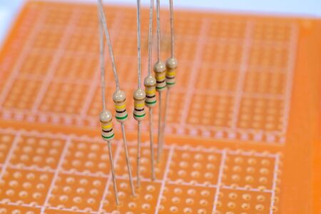 Resistors on circuit board of the electronic device. - Stock Image ...