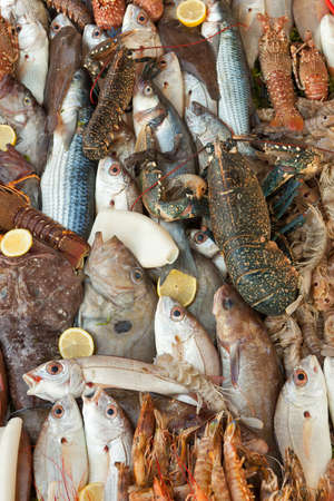 Fresh seafood and fish background lot of speciesの写真素材 [40012034391 ...