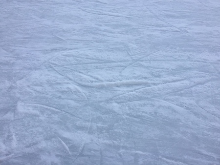 Background of light ice in skate scratches, abstract texture surface ...