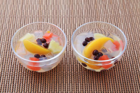 fruits mitsumame japanese dessert closeup isolated on tableの素材 ...