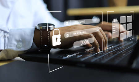 Young executives login username and password on a computer laptop ...