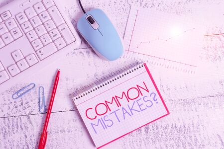 Writing note showing Common Mistakes question. Business concept for ...