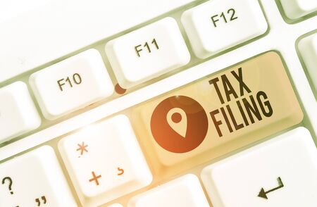 Conceptual hand writing showing Tax Filing. Concept meaning Submitting ...