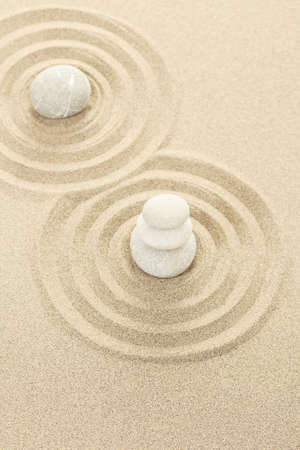 Balance of three zen stones in sand - Stock Image - Everypixel