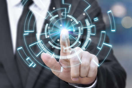 Creating innovative technologies. Business hand touching on data ...