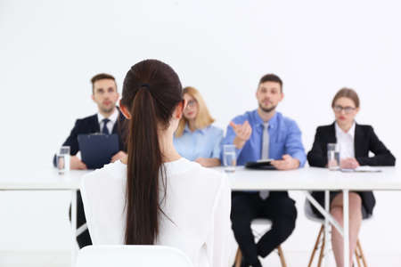 Job interview concept. Human resources commission interviewing woman ...