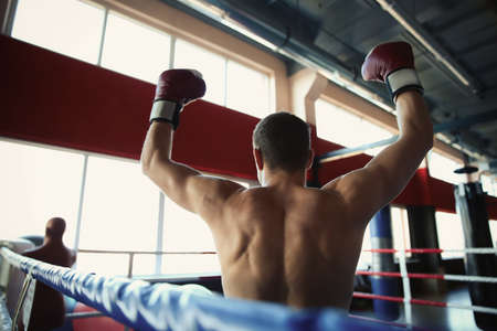 Young man in boxing ring - Stock Image - Everypixel