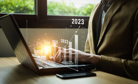 stock market trends for 2023, Businessman calculating financial data ...
