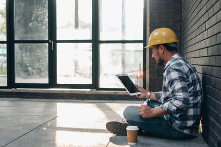 Construction worker working on a computer Images - Search Images on ...