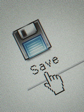Close-up of an interface computer save button and a hand mouse cursorの ...
