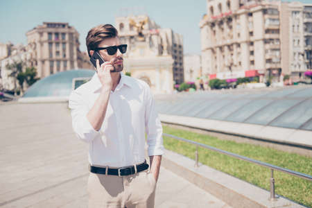 Portrait of handsome serious attractive busy smart rich luxurious ...