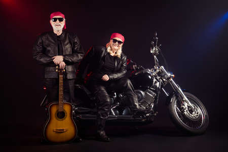Full length photo of old two cool bikers man lady sit chopper rock ...