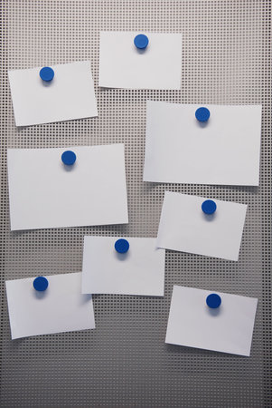 Magnet Bulletin Board with blue magnets on metalboardの写真素材 [40003384536 ...
