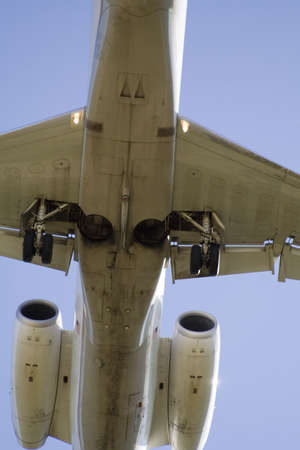 Underside of a Jet as it flys overhead close to the ground - approach ...