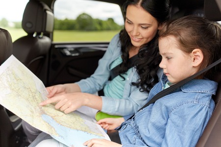 family, transport, road trip and people concept - happy woman and ...
