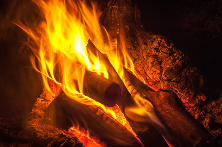 fire burning fire. Fire burning in the night. crest of flame on burning ...