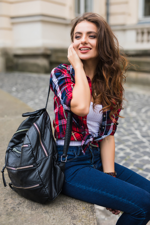 Outdoor street stile portrait of pretty woman in fall casual outfit ...