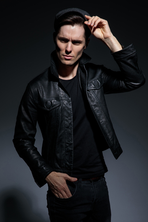 Photo of Concerned guy holding his hand - ID:124454974 - Royalty Free ...