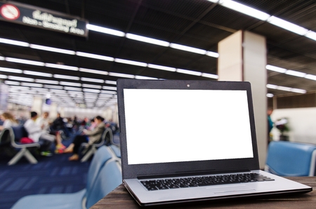 laptop computer with white blank screen for presentation on wooden desk ...