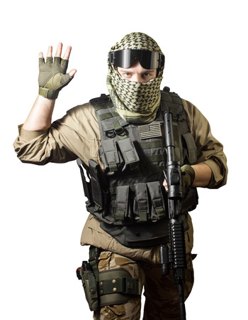 Isolated photo of a fully equipped military soldier standing with rifle ...