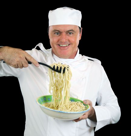 Chef lifting cooked spaghetti from a bowl with a pasta fork.の写真素材 ...