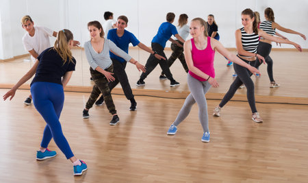 Female coach holds group dance training in studio - Stock Image ...