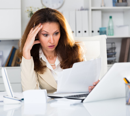 Young businesswoman is having problems with project in office. - Stock ...