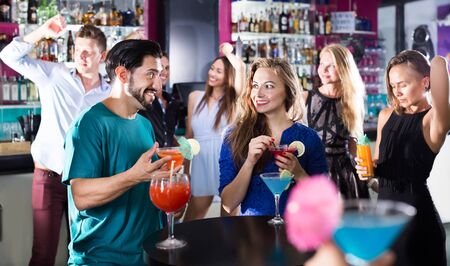 Young students dancing on party with a cocktails at the club - Stock ...