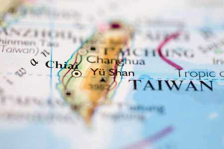 Shallow depth of field focus on geographical map location of Mount Yu ...