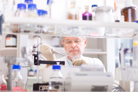 Life scientist researching in laboratory. Life sciences comprise fields ...