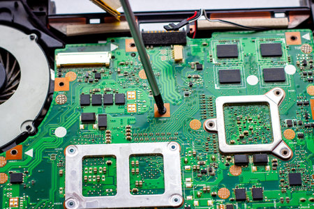 Fixing electronic components with the screwdriver inside the pc ...