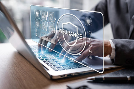 Businessman with virtual screen of insurance protection for house, car ...