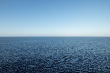 High view over an ocean horizon on a clear day - Stock Image - Everypixel