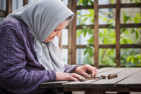 Money, coins, retired grandmother and the concept of a living wage ...