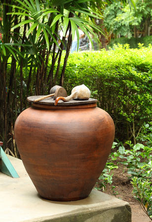 Image of top view of big water jar on the ground floor in Thai house ...