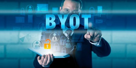 IT director is touching BYOT on an interactive visual screen. - Stock ...
