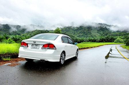 KRABI THAILAND - JANUARY 2 :White Honda Civic car in the wet road and ...