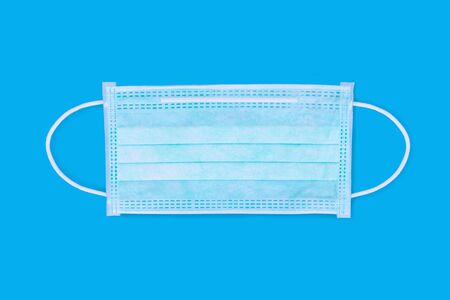 Ear-loop face mask 3 ply, Safety masks on blue background. dust ...